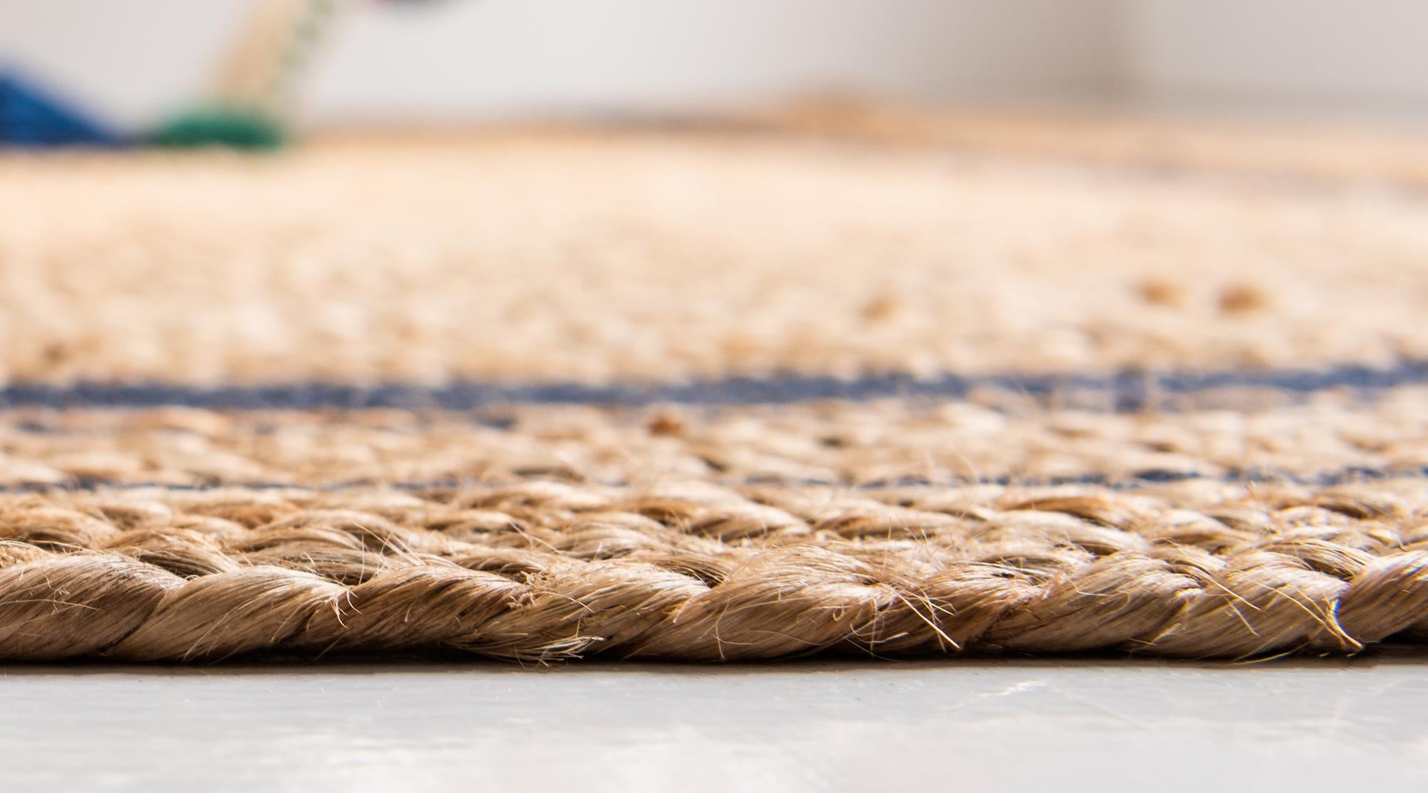 Natural and Navy Blue 8' x 8' Hand Braided Jute Round Rug | Rugs.com