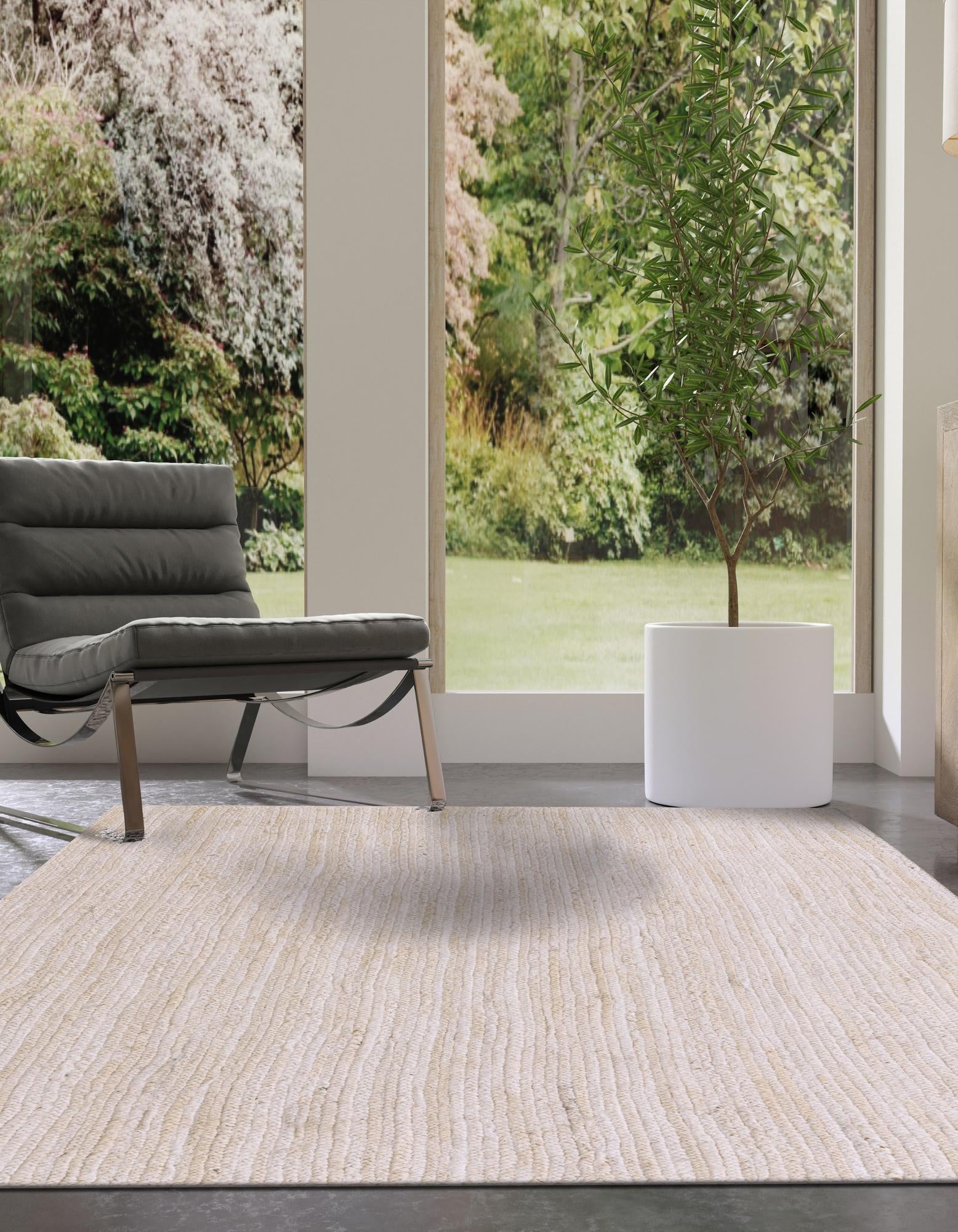 White 9' x 12' Hand Braided Jute Rug | Rugs.com